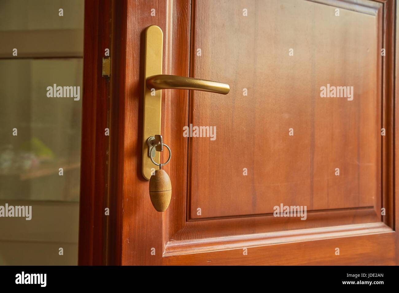 Front door open, sunny weather outside Stock Photo - Alamy