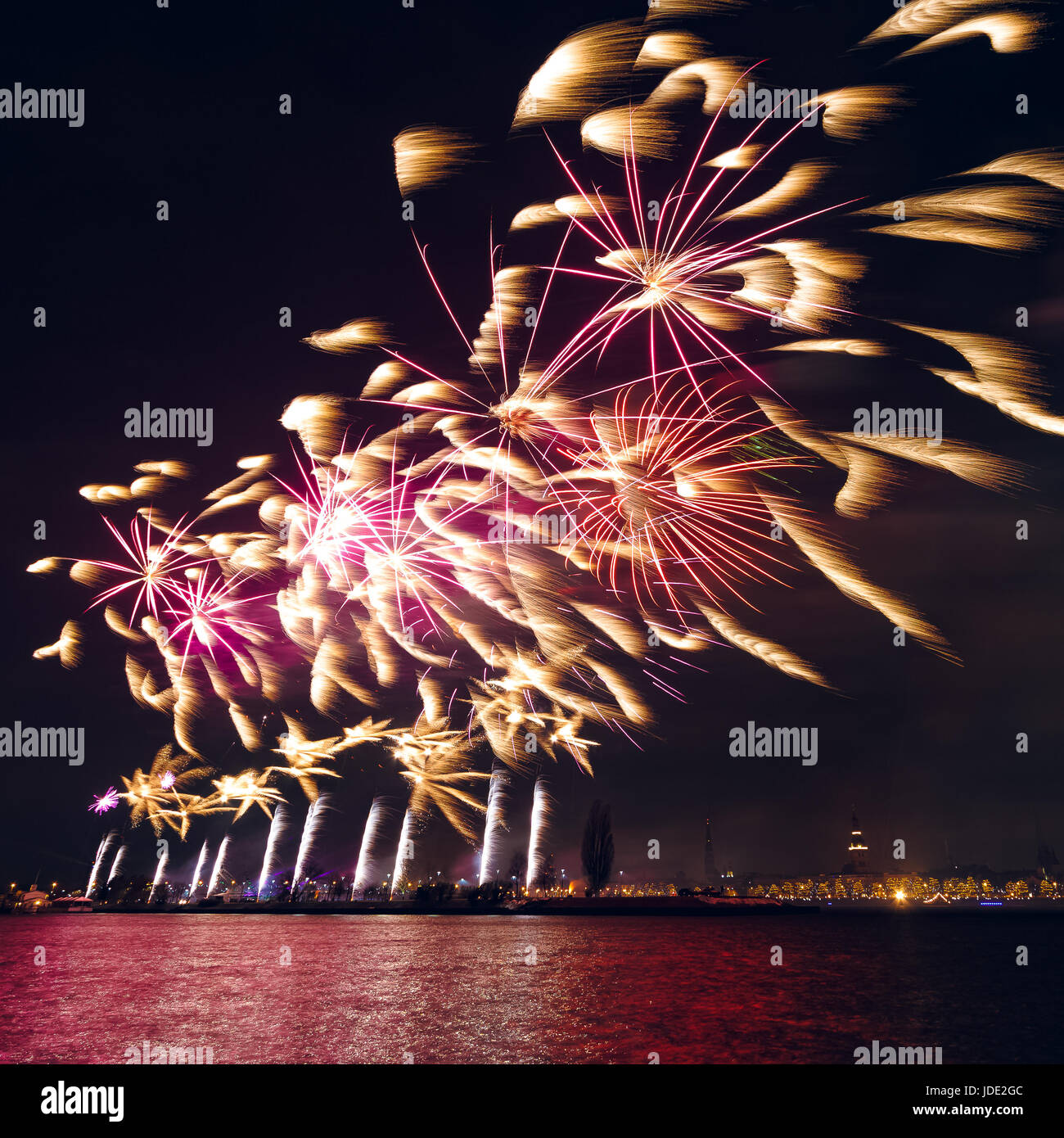 Colored New Year fireworks in centre of Riga Stock Photo - Alamy