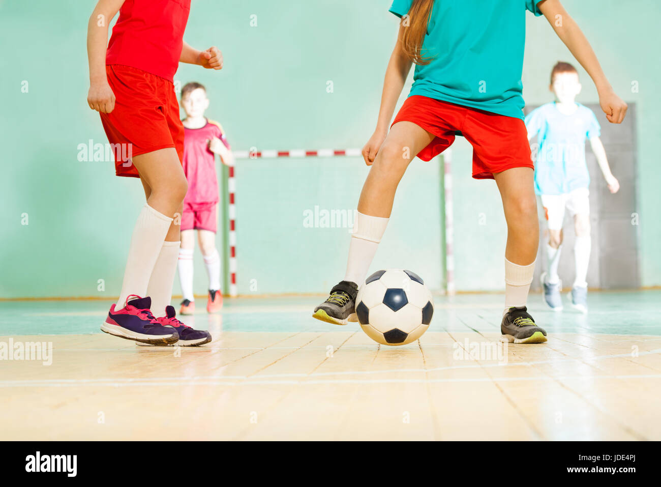 Preteen girl football ball hi-res stock photography and images - Alamy