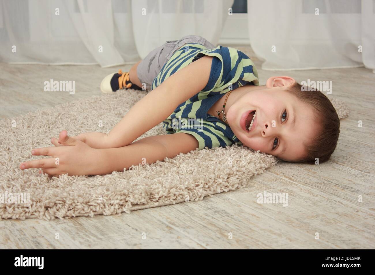 Portrait of cute little boy at home Stock Photo - Alamy