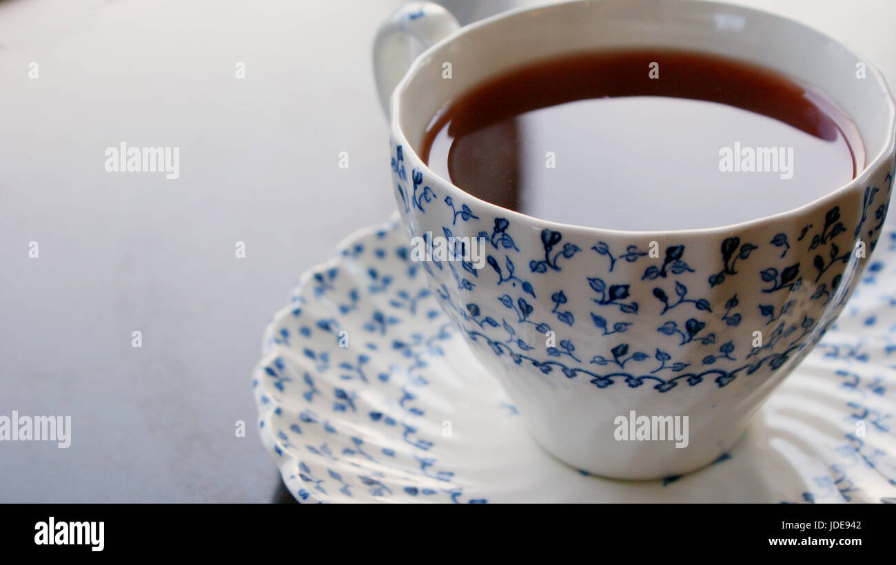 A warm cup of tea in classic china Stock Photo - Alamy