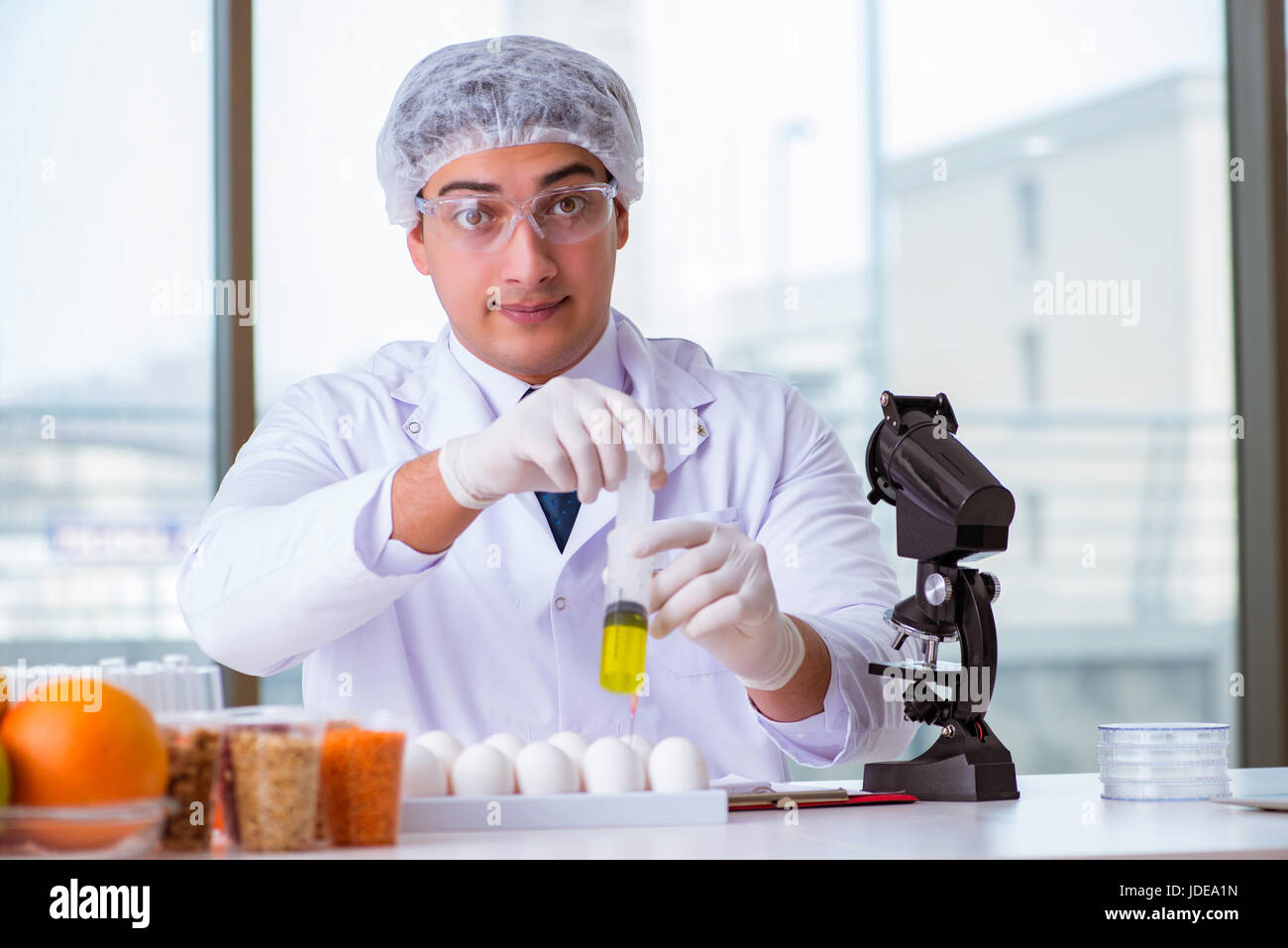 Nutrition expert testing food products in lab Stock Photo - Alamy