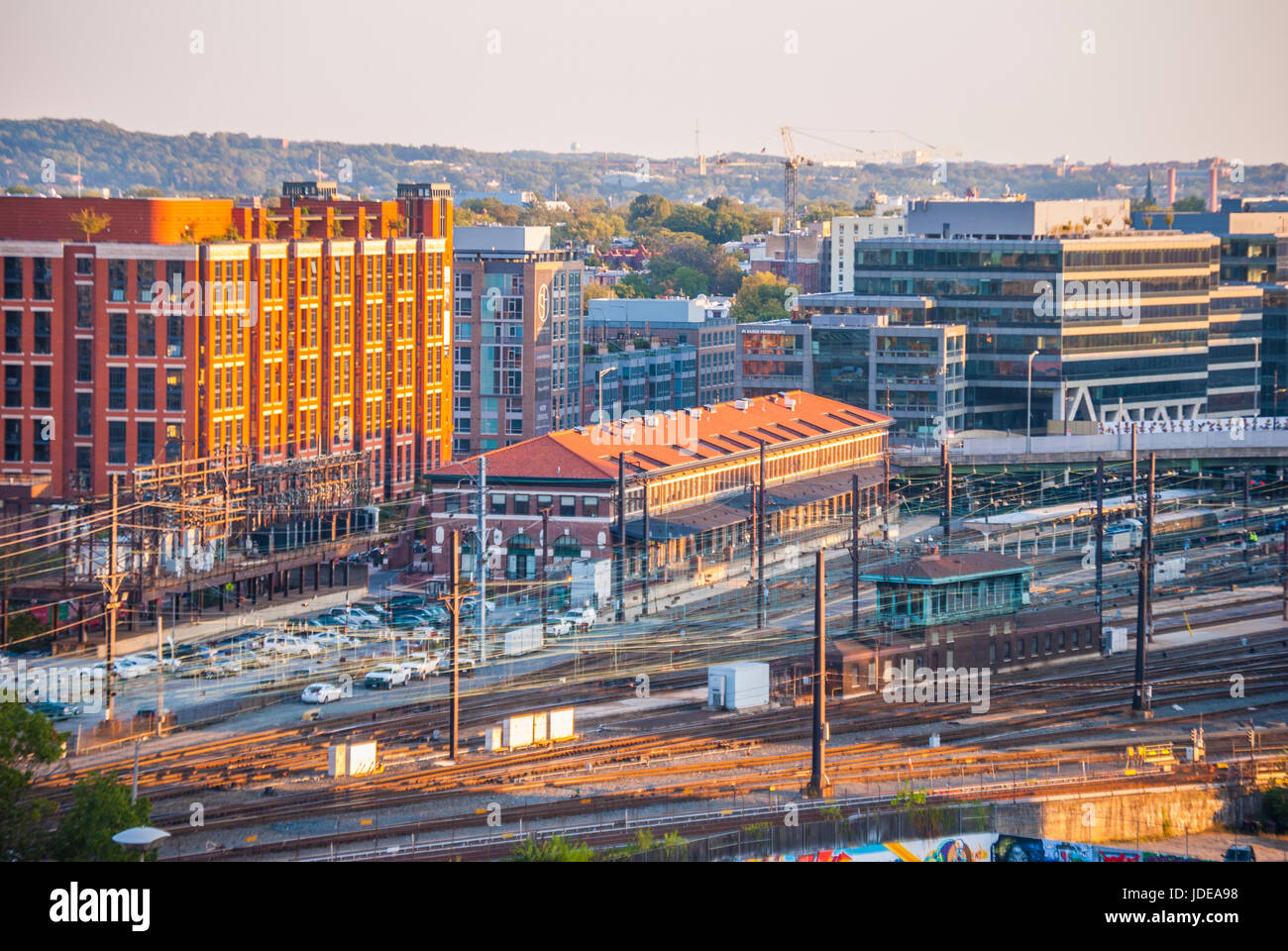 Metro lines, water towers, and buildings in Washington DC in the warm ...