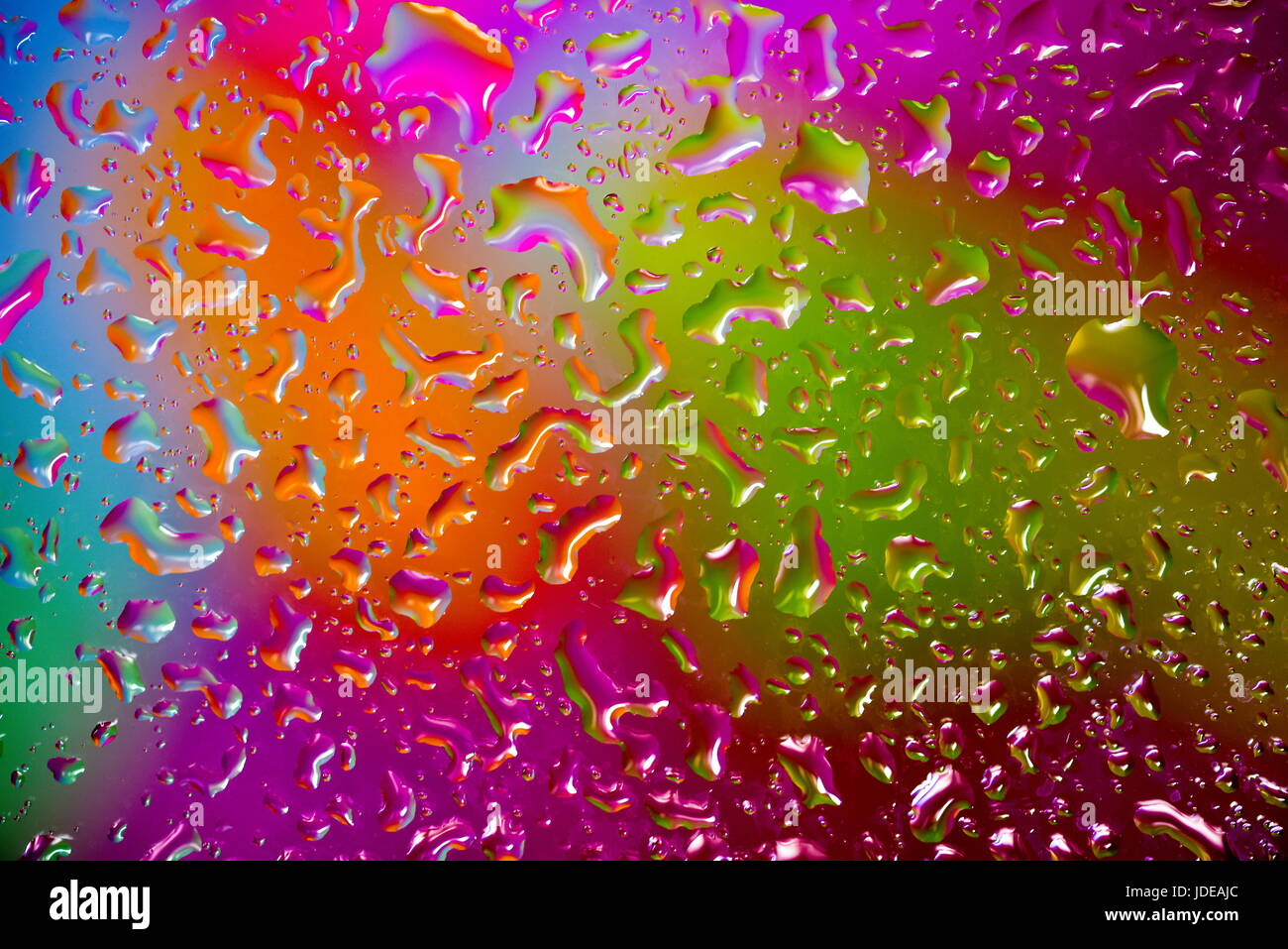 Colorful Water drops background Stock Photo - Alamy
