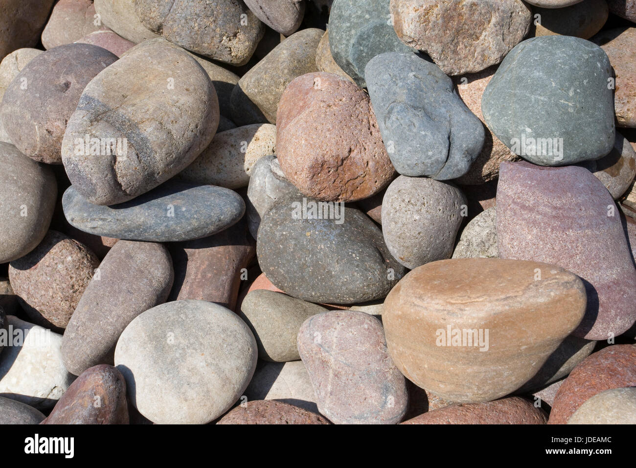 Stone wall rounded stones hi-res stock photography and images - Alamy