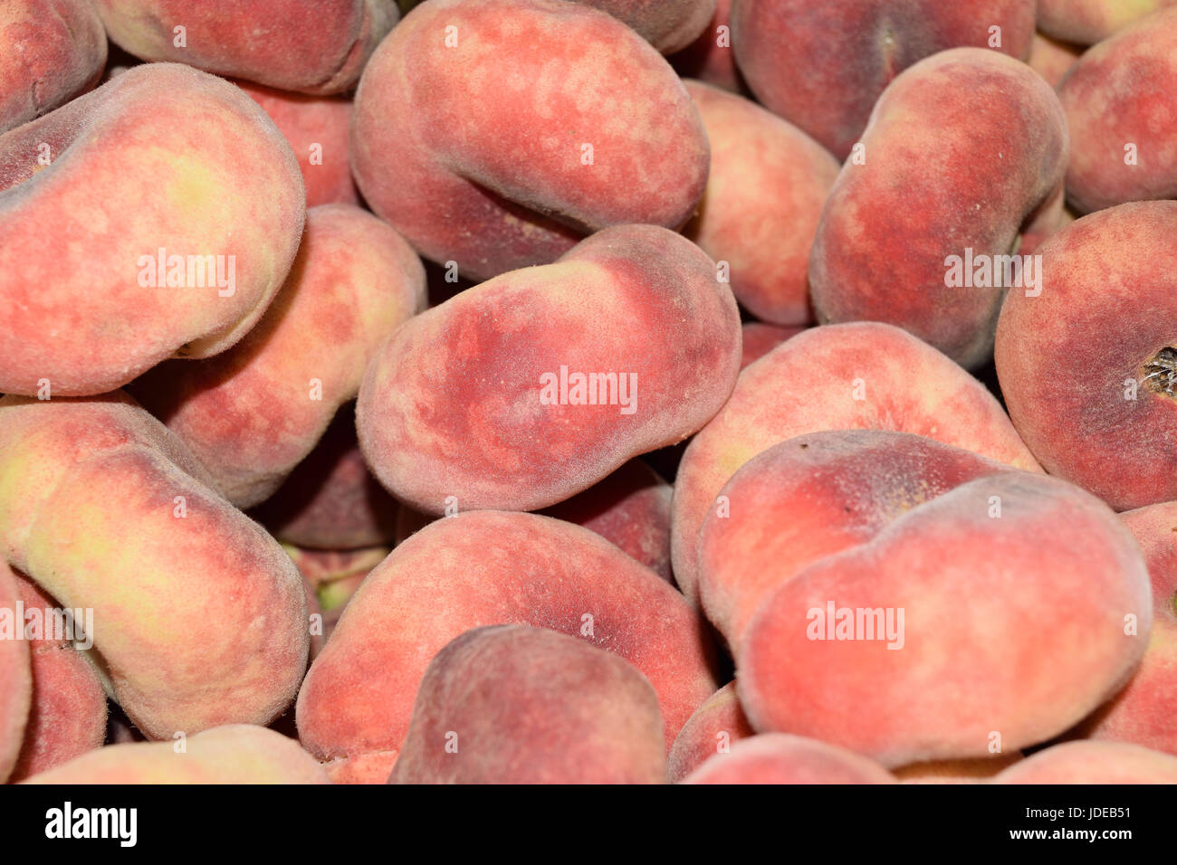 Flat peaches hi-res stock photography and images - Alamy