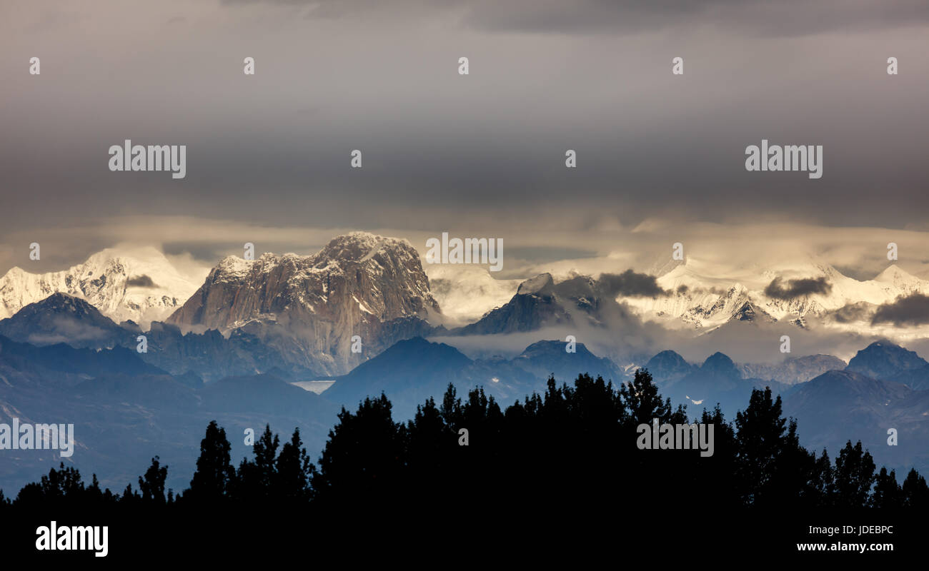 Fog lifts off Moose Tooth peak in Alaska range in Denali National Park ...