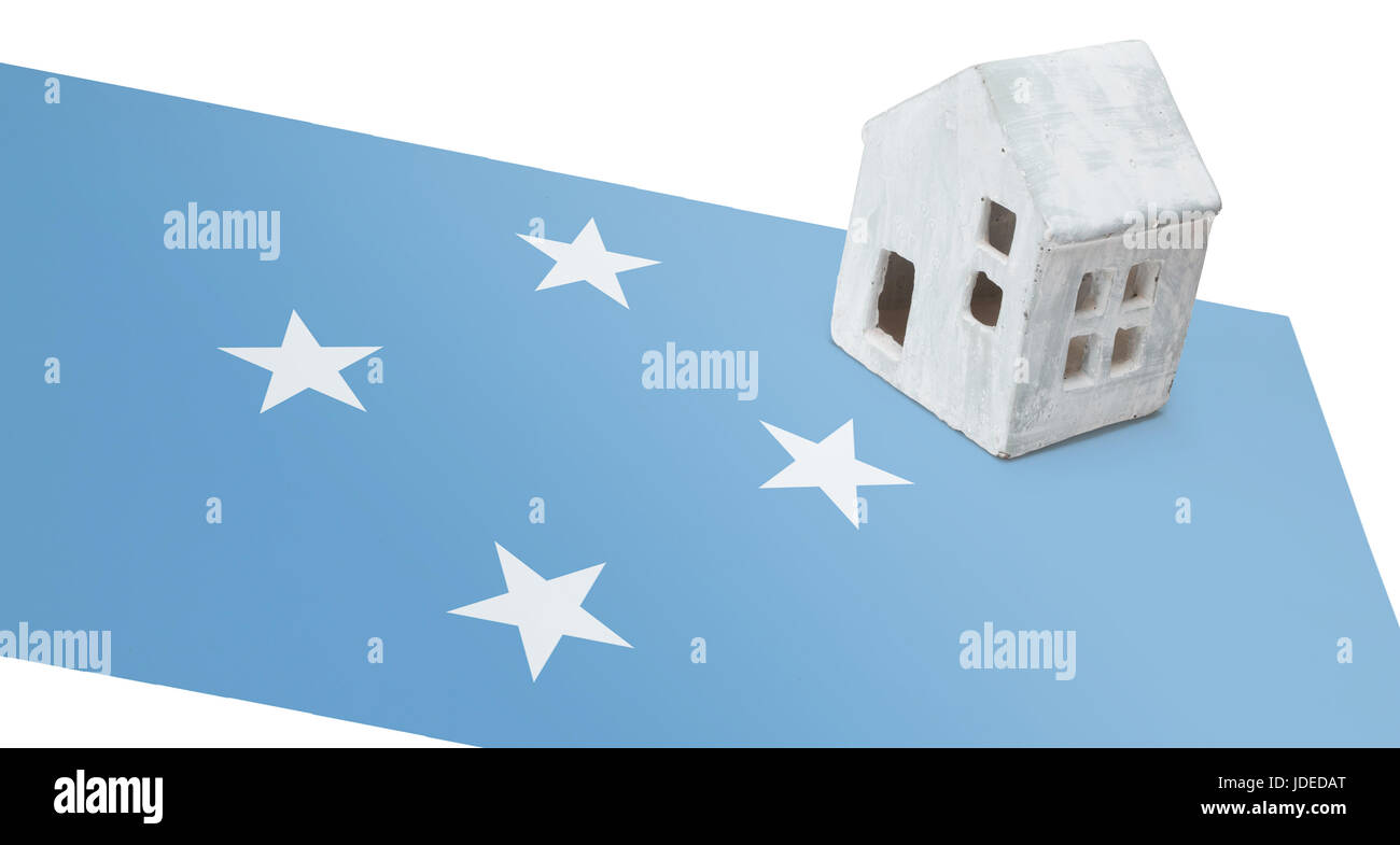Small house on a flag - Living or migrating to Micronesia Stock Photo ...