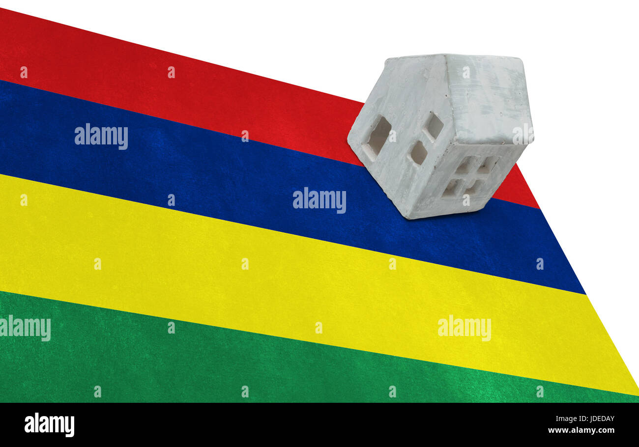 Small house on a flag - Living or migrating to Mauritius Stock Photo ...
