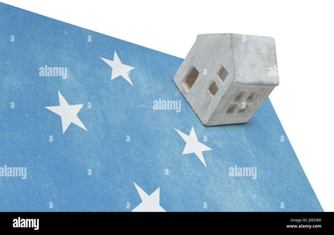 Small house on a flag - Living or migrating to Micronesia Stock Photo ...