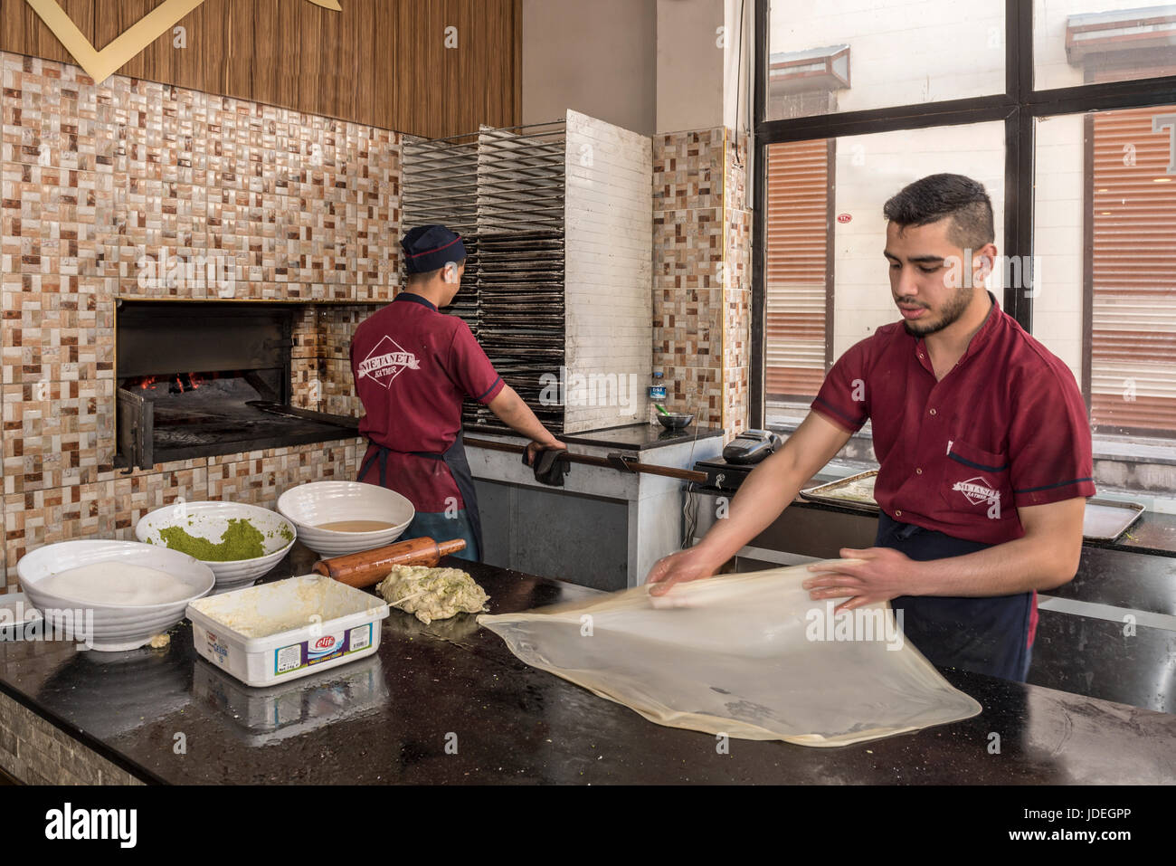 Inside a local oven shop preparing a thin bread, Gaziantep ...