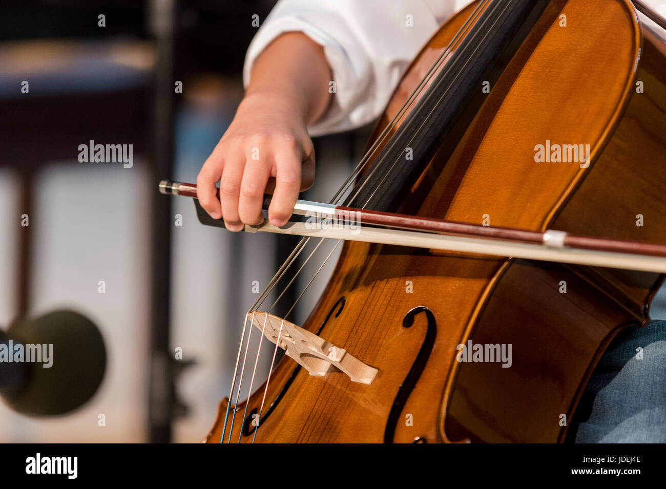 Boy playing cello violoncello hi-res stock photography and images - Alamy