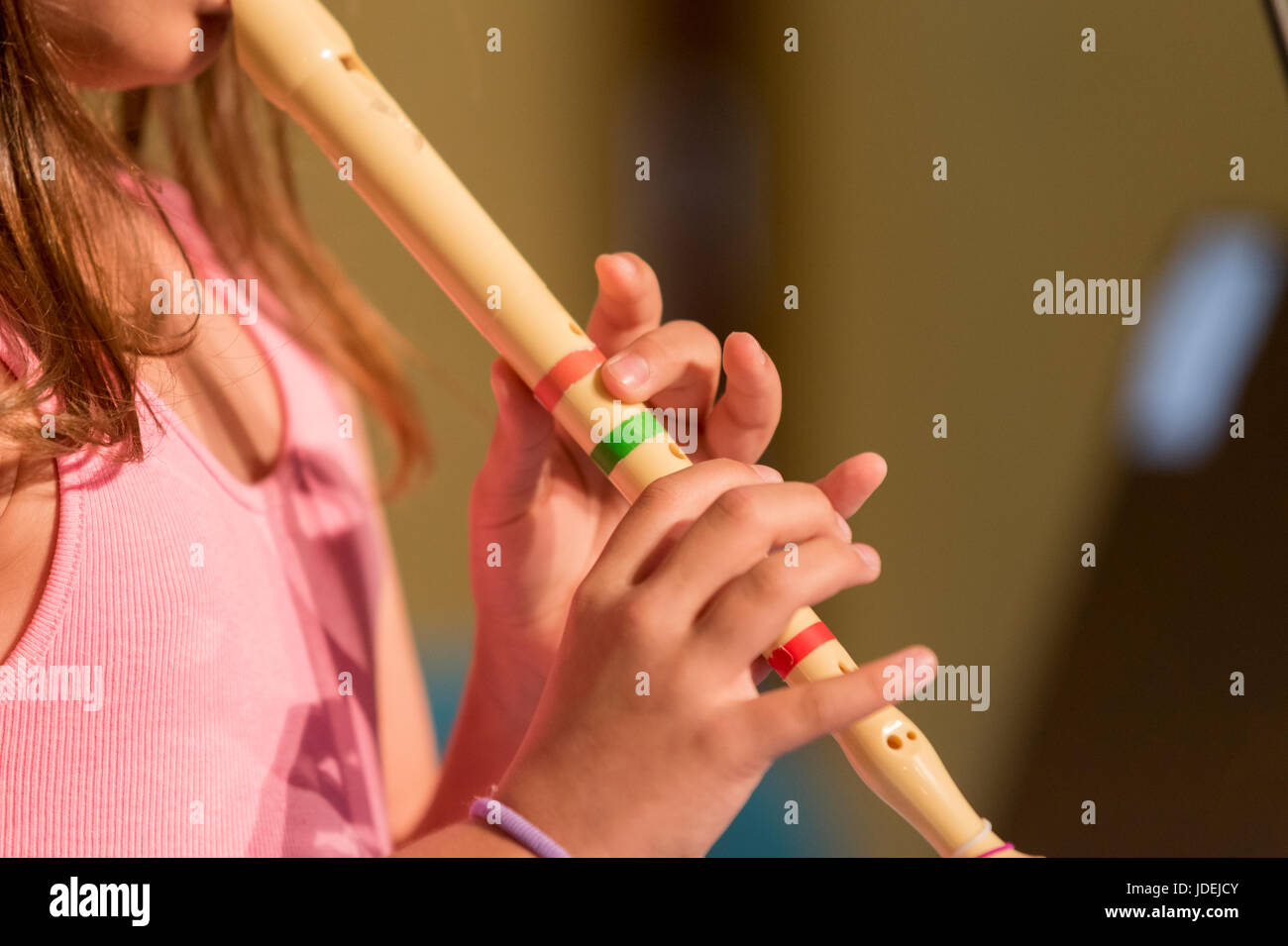 Young Woman Musician Plays Flute Stock Photos & Young Woman Musician ...