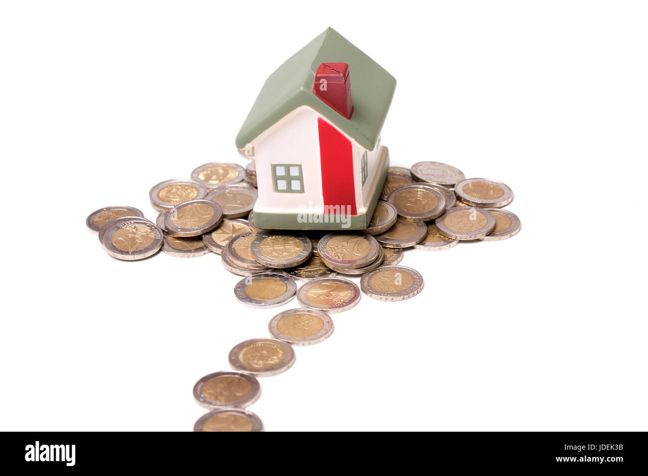 small house and coins, concept, isolated on white background Stock ...
