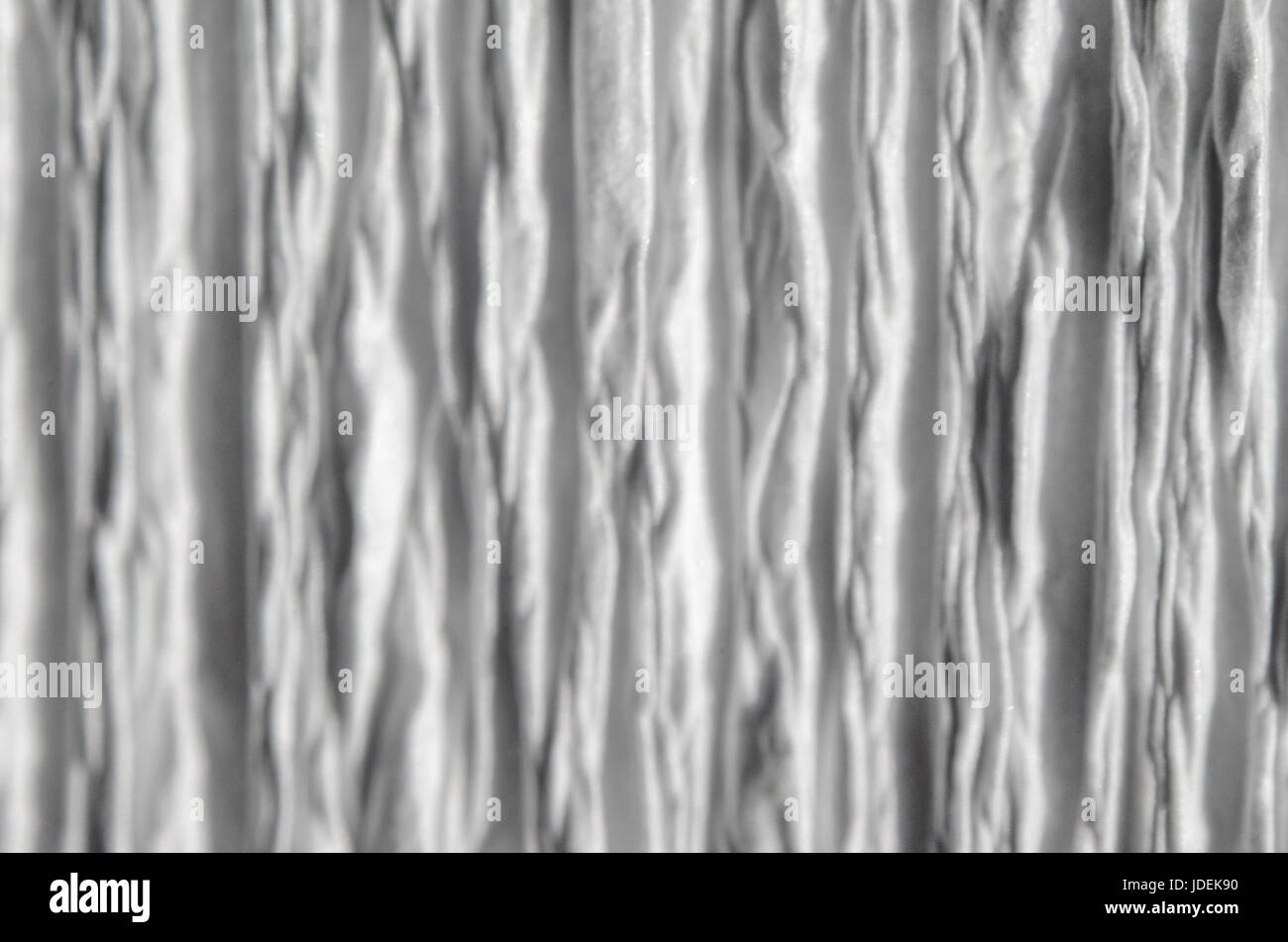 White texture of embossed paper. Macro. Shallow depth of field ...