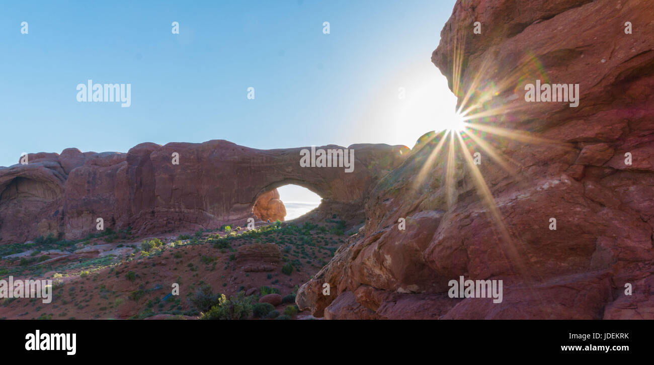 Arches National Park at sunrise. North window arch Stock Photo - Alamy