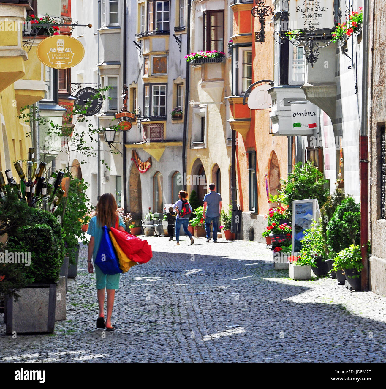 HALL, AUSTRIA - JUNE 15: Undefined young woman goes shopping in the ...