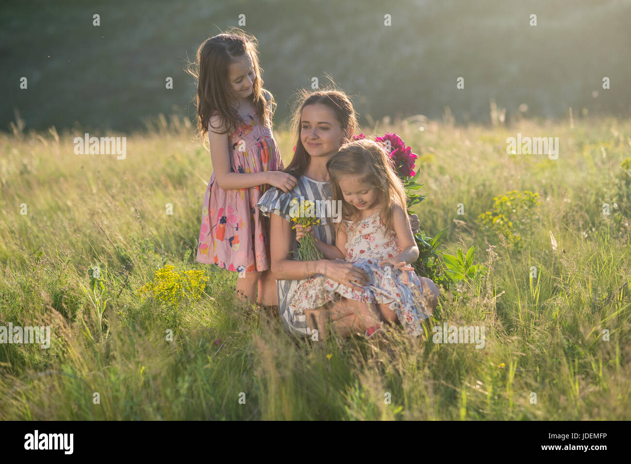Beautiful happy mother two daughters hi-res stock photography and ...
