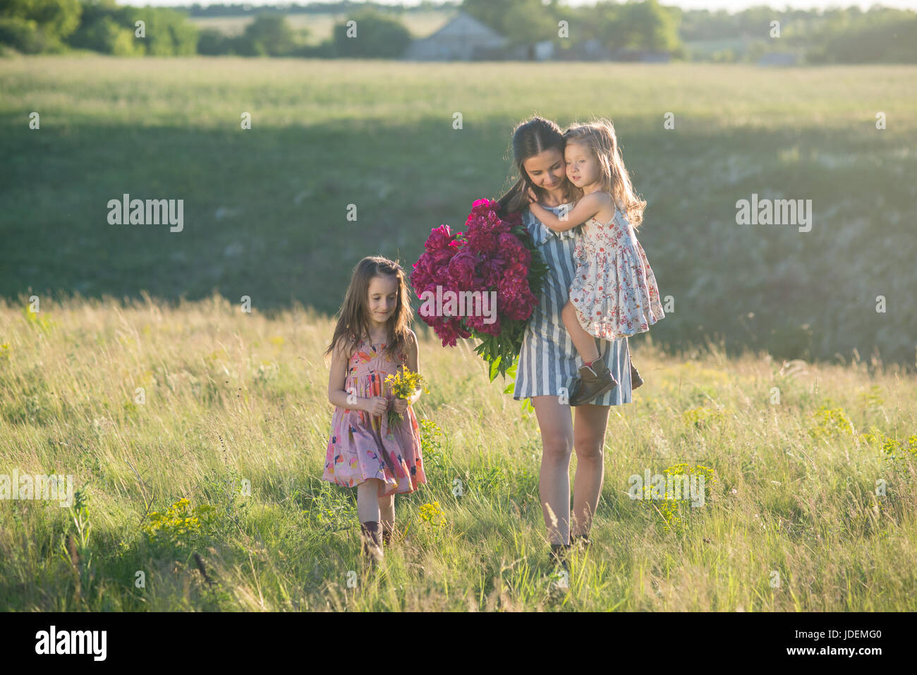 Portrait family mom two daughters hi-res stock photography and images ...