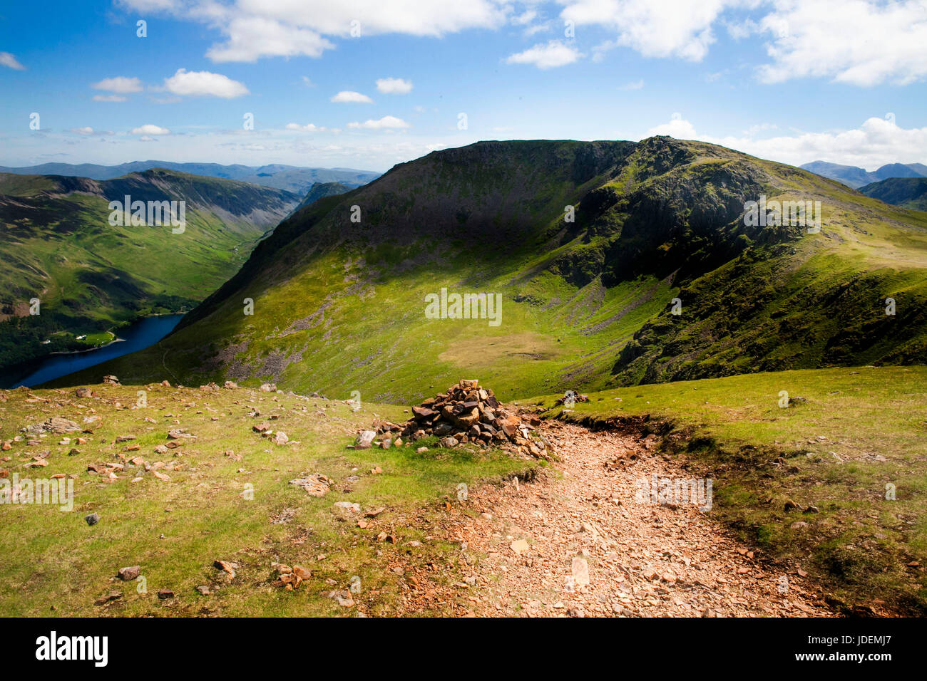 Reaching the summit of Red Pike Stock Photo - Alamy