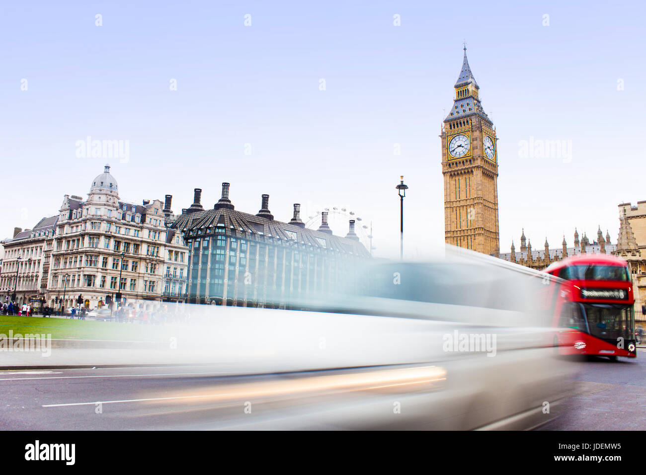 Traffic in Central London city, long exposure photo of red bus in ...
