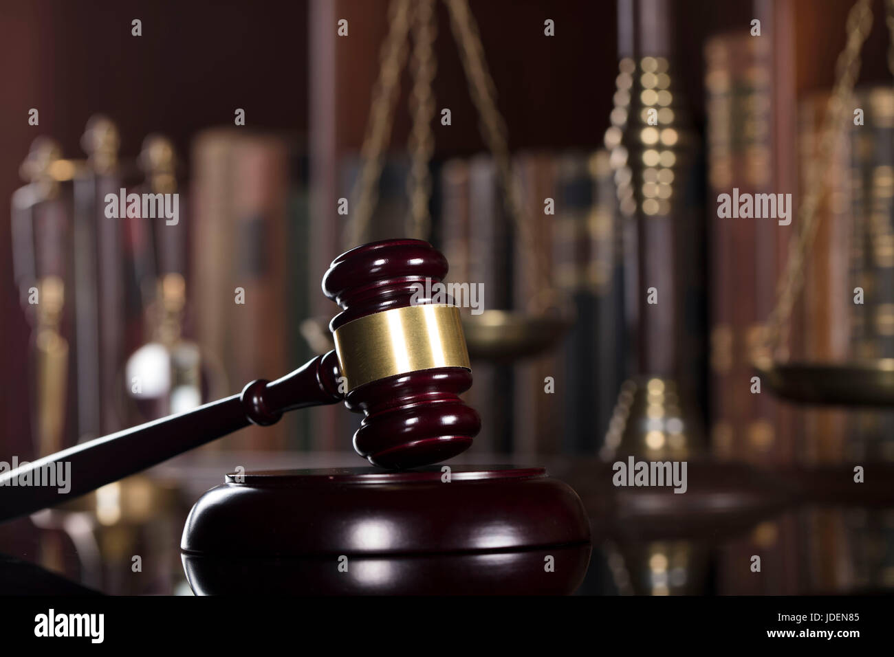 Gavel of the jugde, Themis in the court library Stock Photo - Alamy