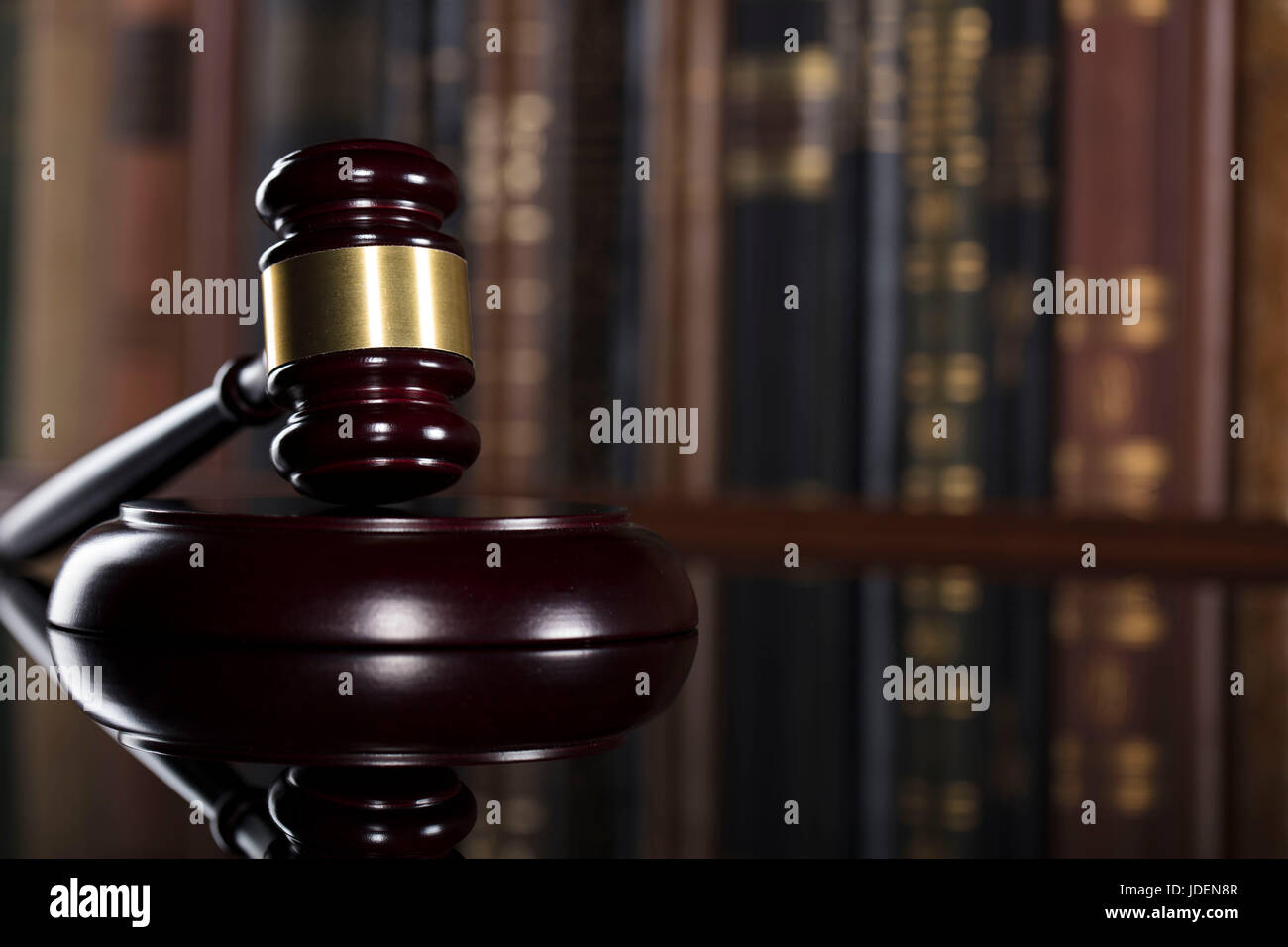 Gavel of the jugde, Themis in the court library Stock Photo - Alamy