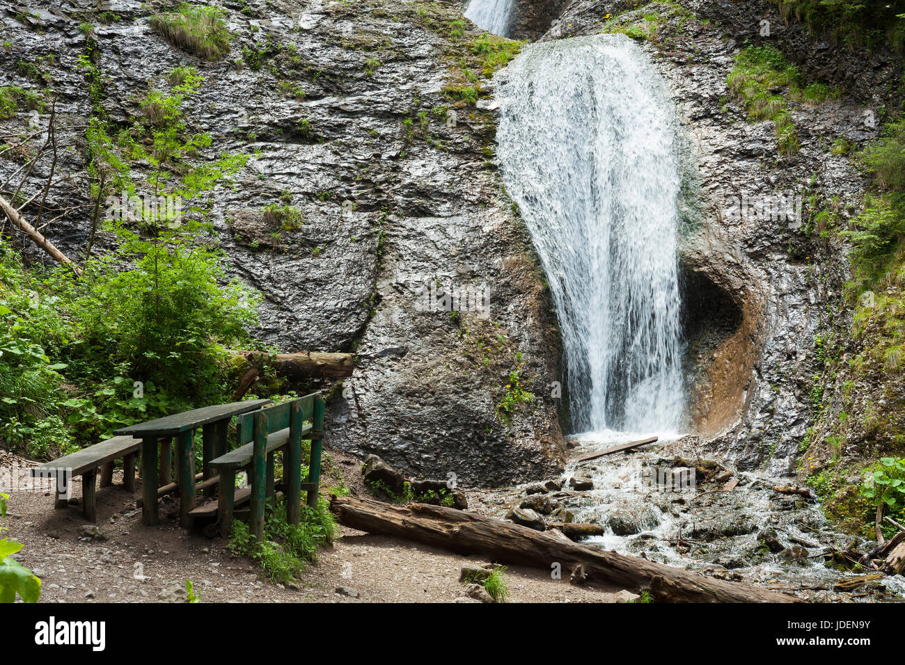 waterfall and bench for resting place Stock Photo - Alamy