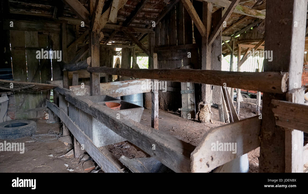 Abandoned barn trough Stock Photo - Alamy