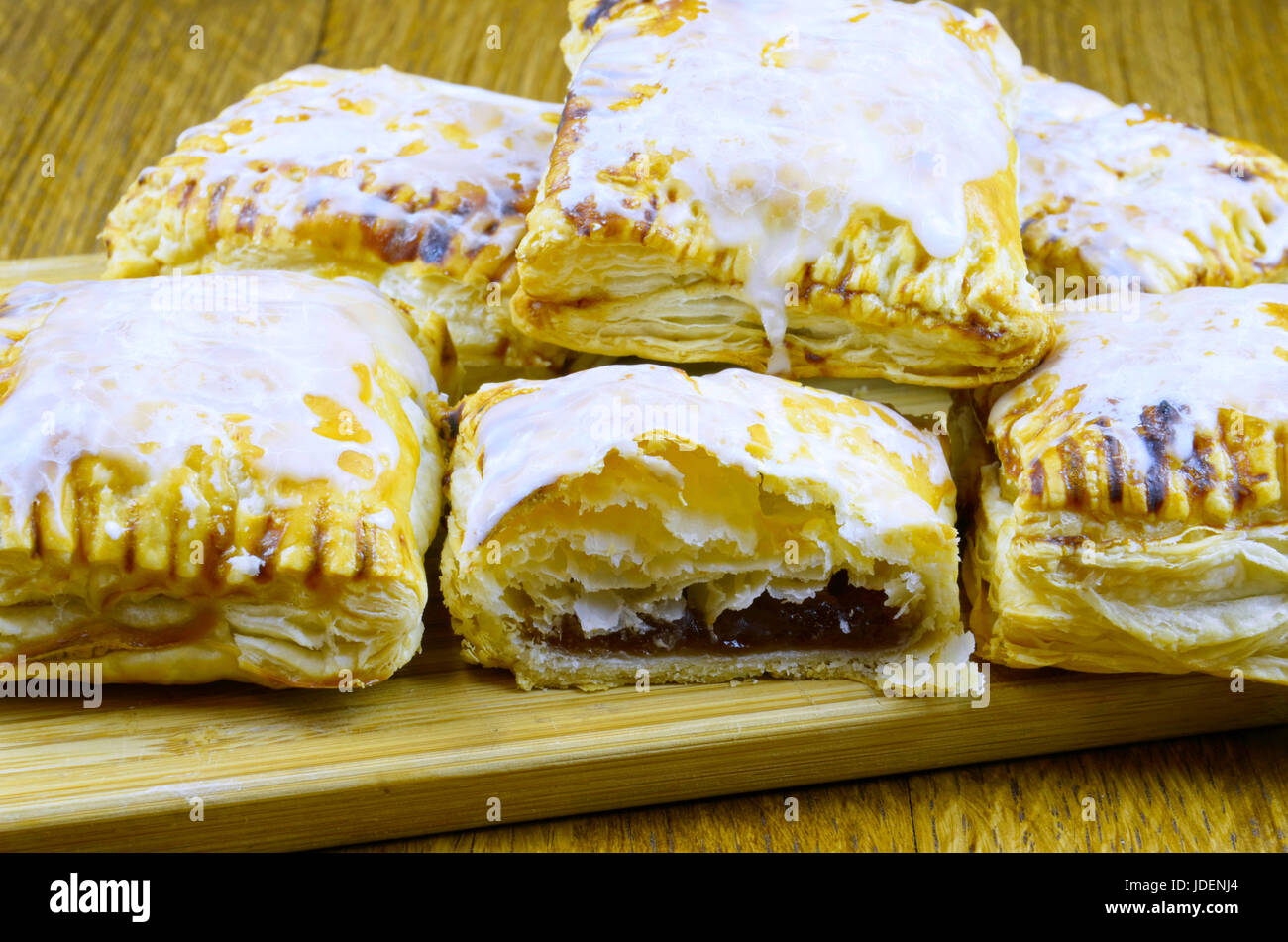 Crisp puff pastry filled with jam sugar-coated Stock Photo - Alamy