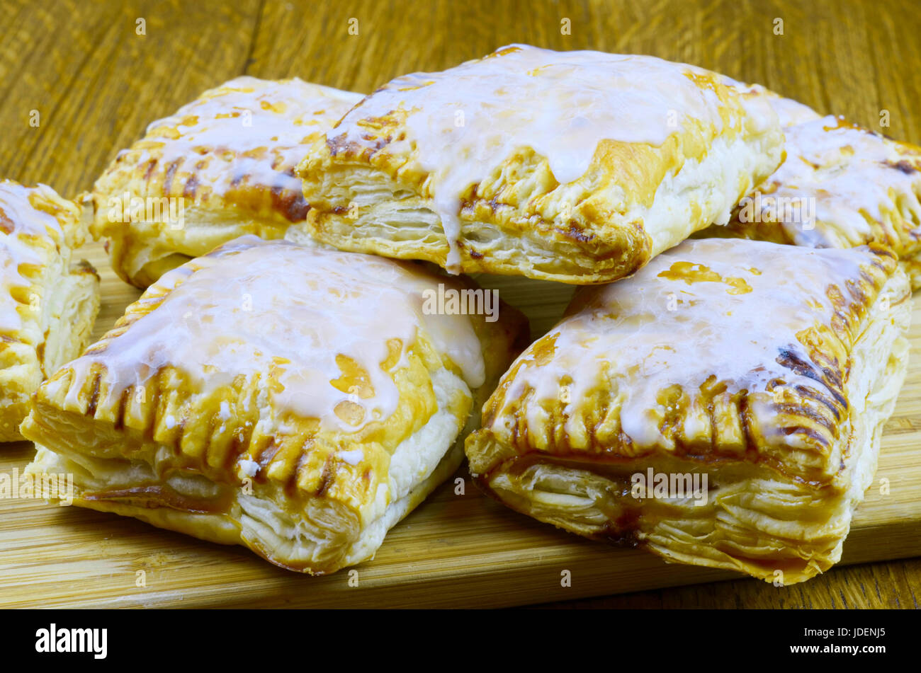 Crisp puff pastry filled with jam sugar-coated Stock Photo - Alamy