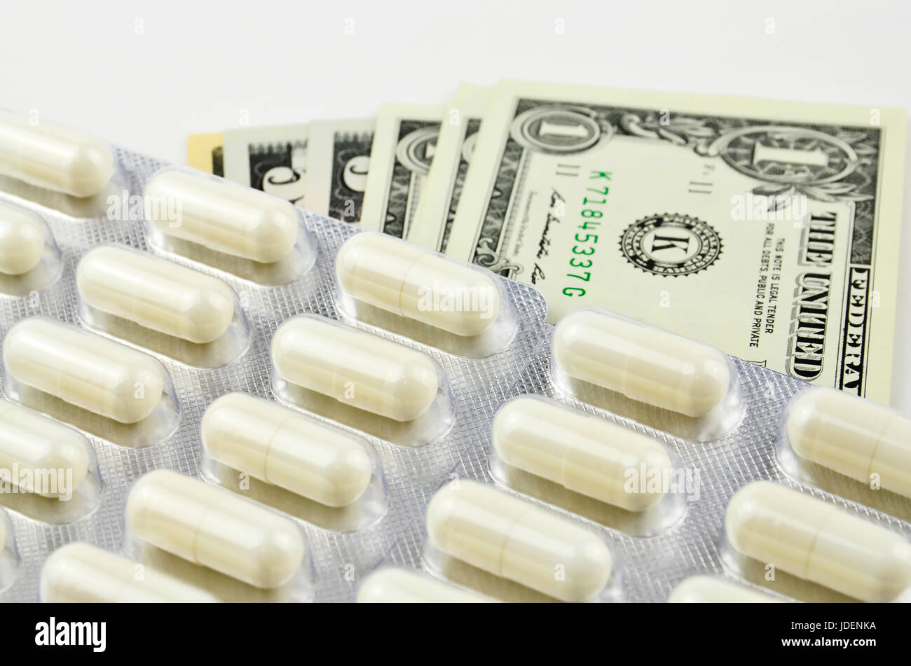 US Dollars and pills shows that the medicaments are very expensive ...