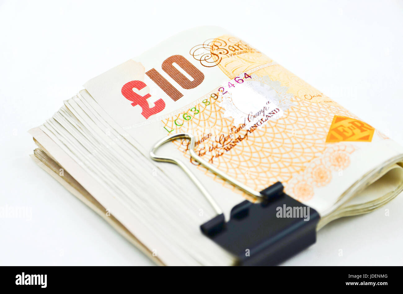 British pound stapled together Stock Photo - Alamy