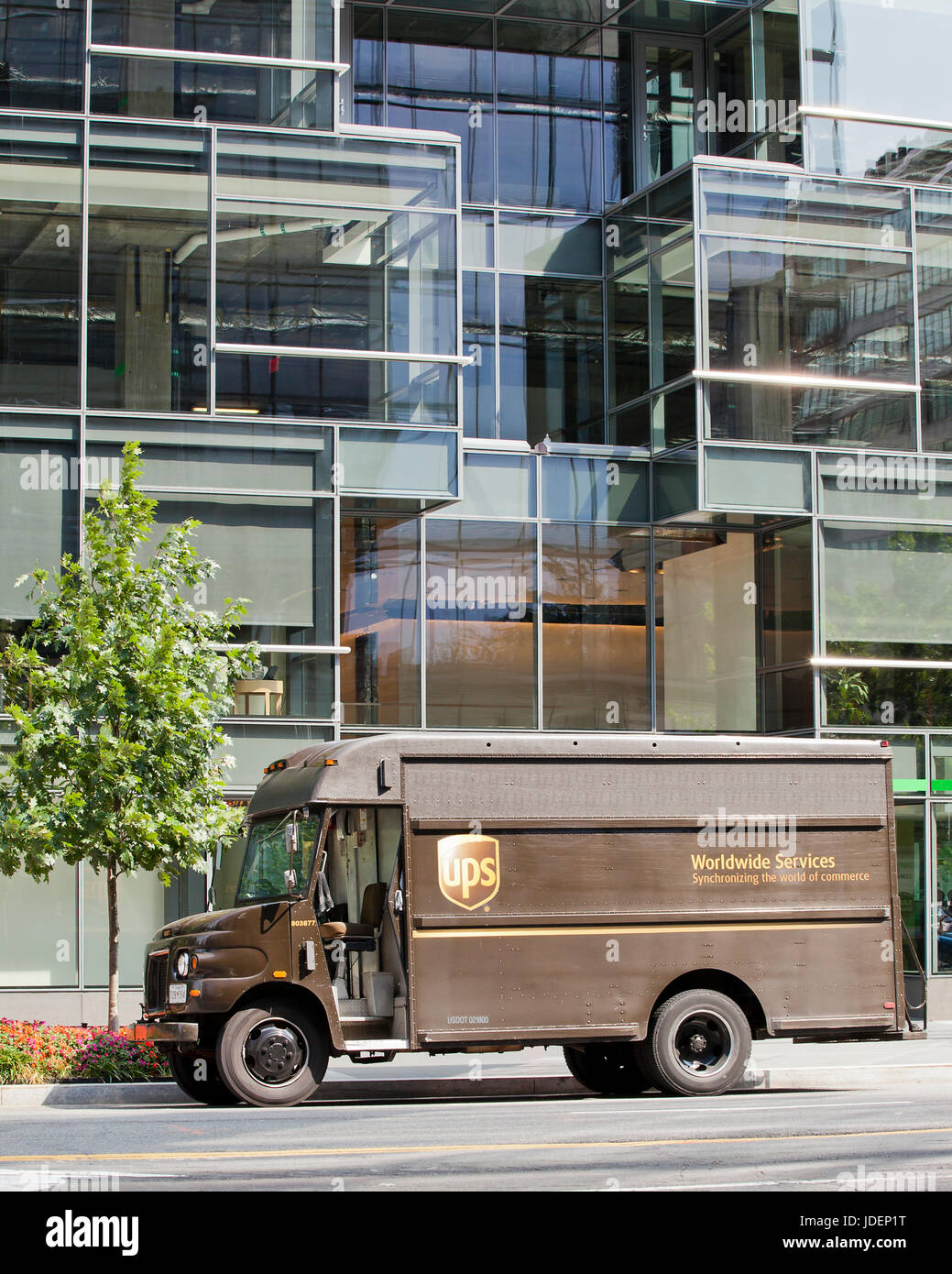 UPS delivery truck parked in front of office building - USA Stock Photo ...