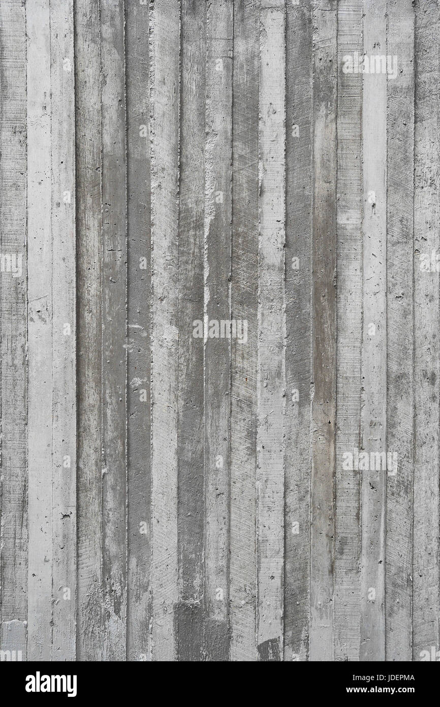 texture of wooden form work stamped on a raw concrete wall as ...