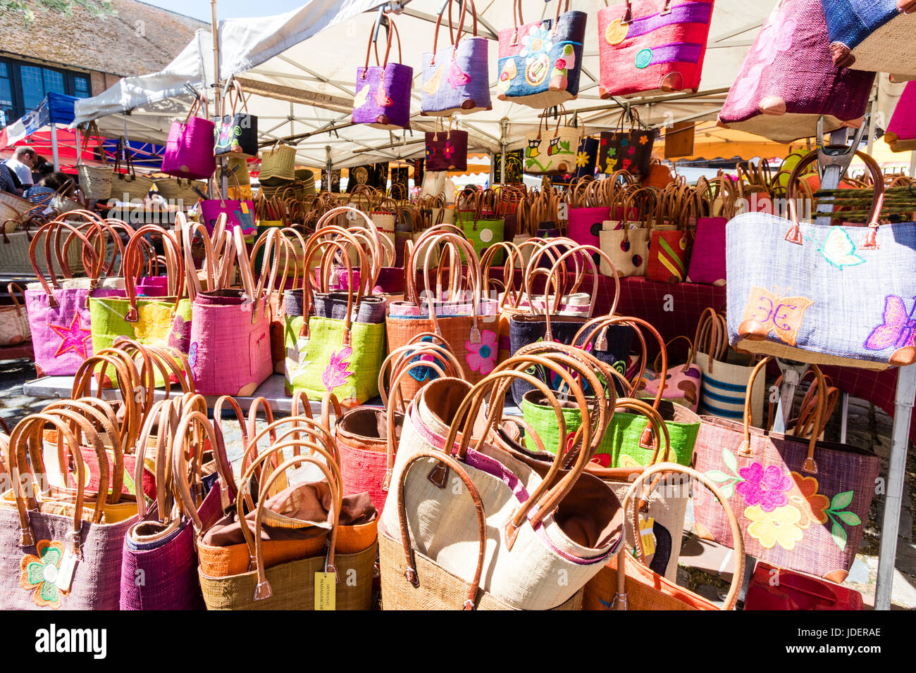 French Market stall selling traditional handbags, shopping bags and ...