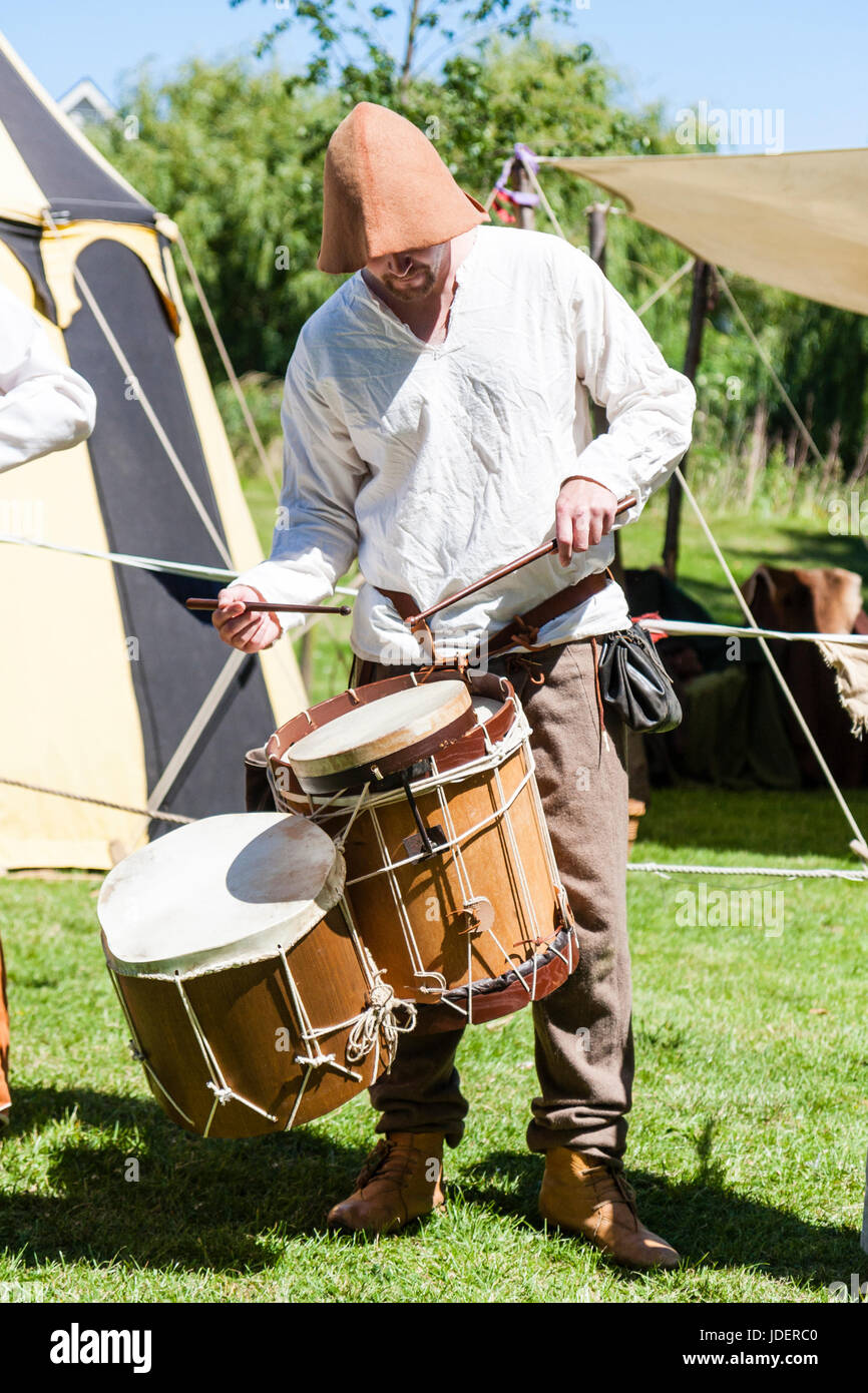 Member of musical living history band Rough Musicke standing in ...