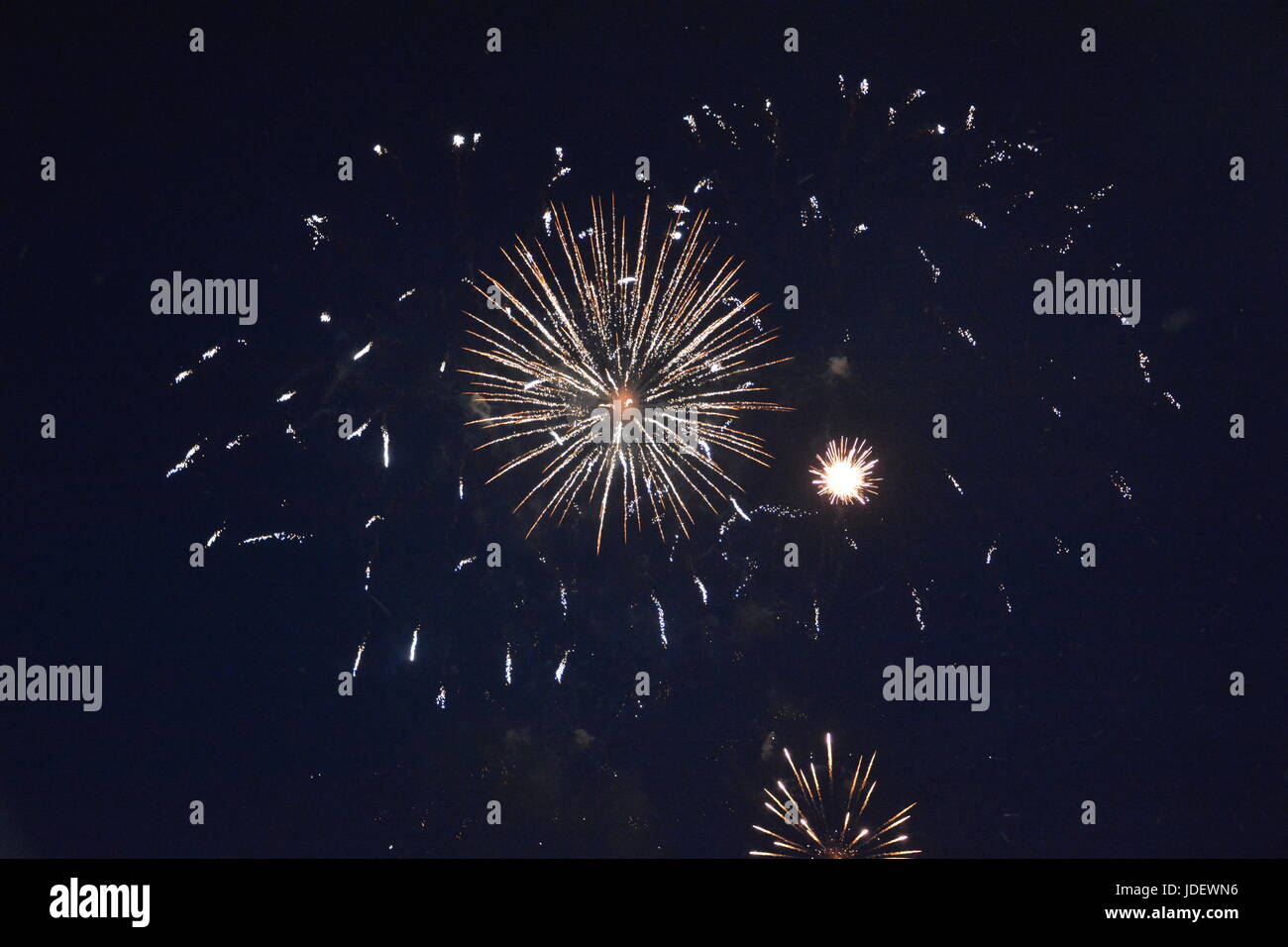 Colored fireworks in the black night sky Stock Photo - Alamy