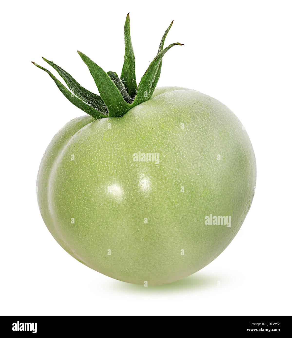 green tomato isolated on white background Stock Photo - Alamy