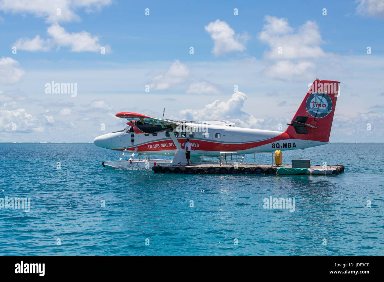 Seaplane at platform in open sea, Ari Atoll, Indian Ocean, Maldives ...
