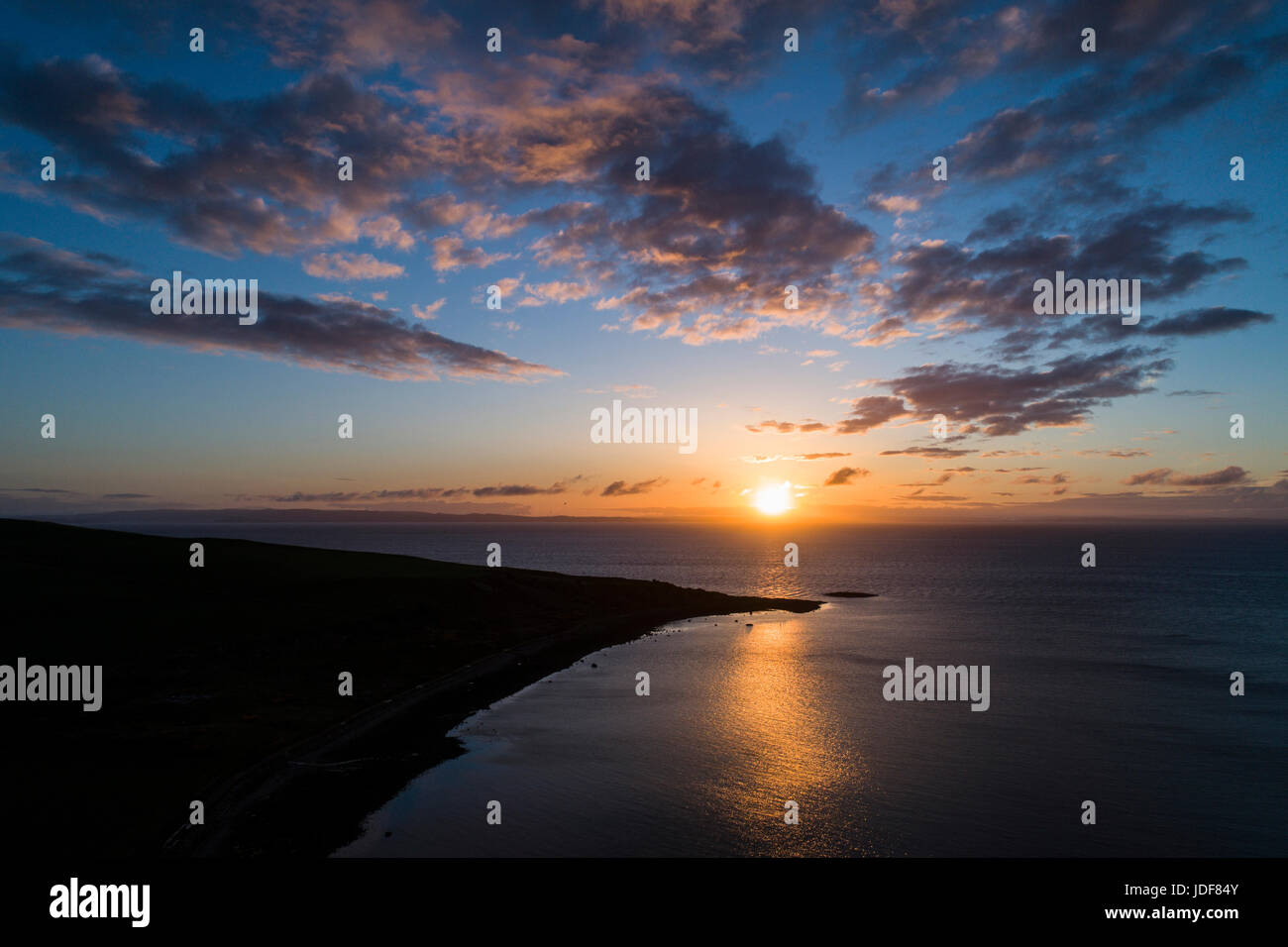 Aerial view of sunrise over Arran, Firth of Clyse Stock Photo - Alamy