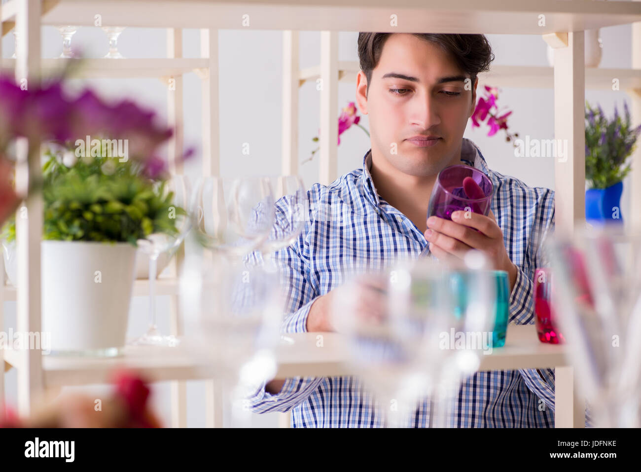 Young handsome man shopping in shop Stock Photo - Alamy