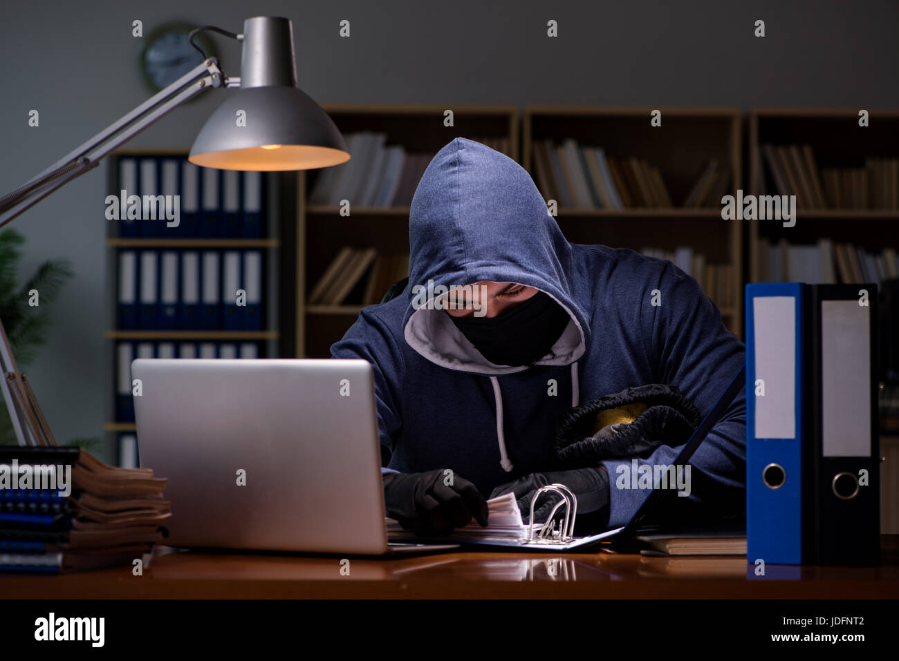 Hacker stealing personal data from home computer Stock Photo - Alamy