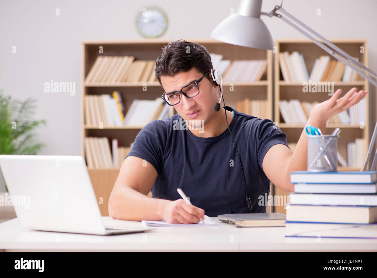 Young freelance worked working on computer Stock Photo - Alamy
