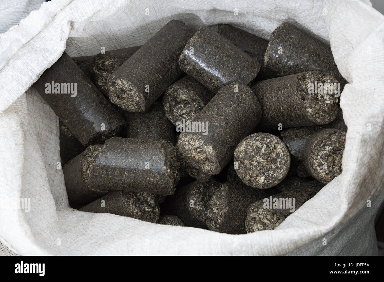 sunflower shell biomass briquettes in the bag Stock Photo - Alamy