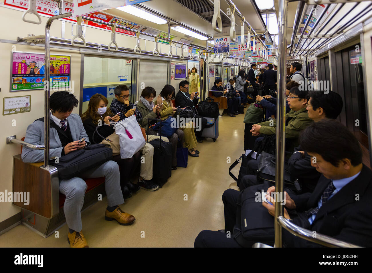 Train commuters in Fukuoka, Japan Stock Photo - Alamy