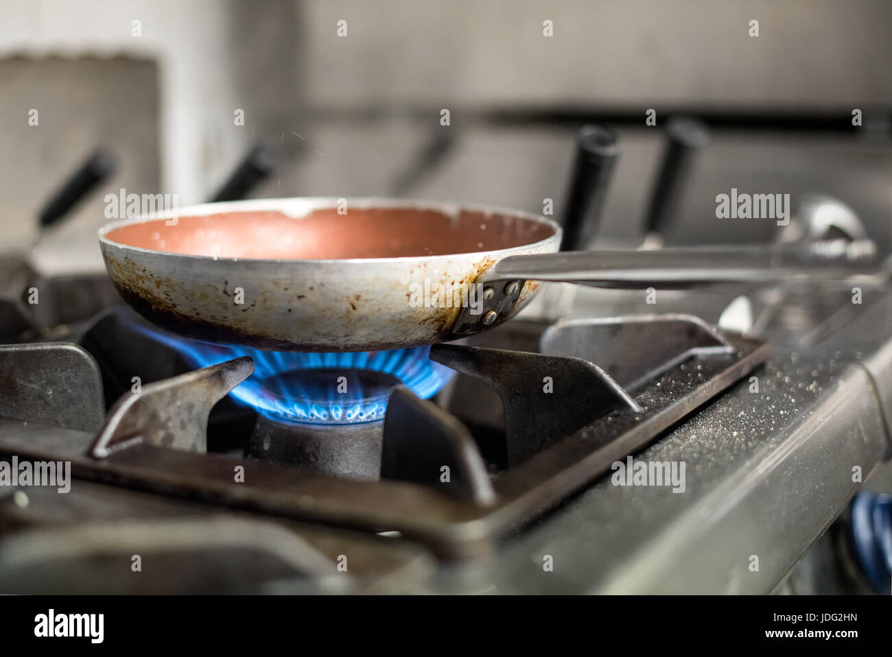 Close up heating frying pan hi-res stock photography and images - Alamy