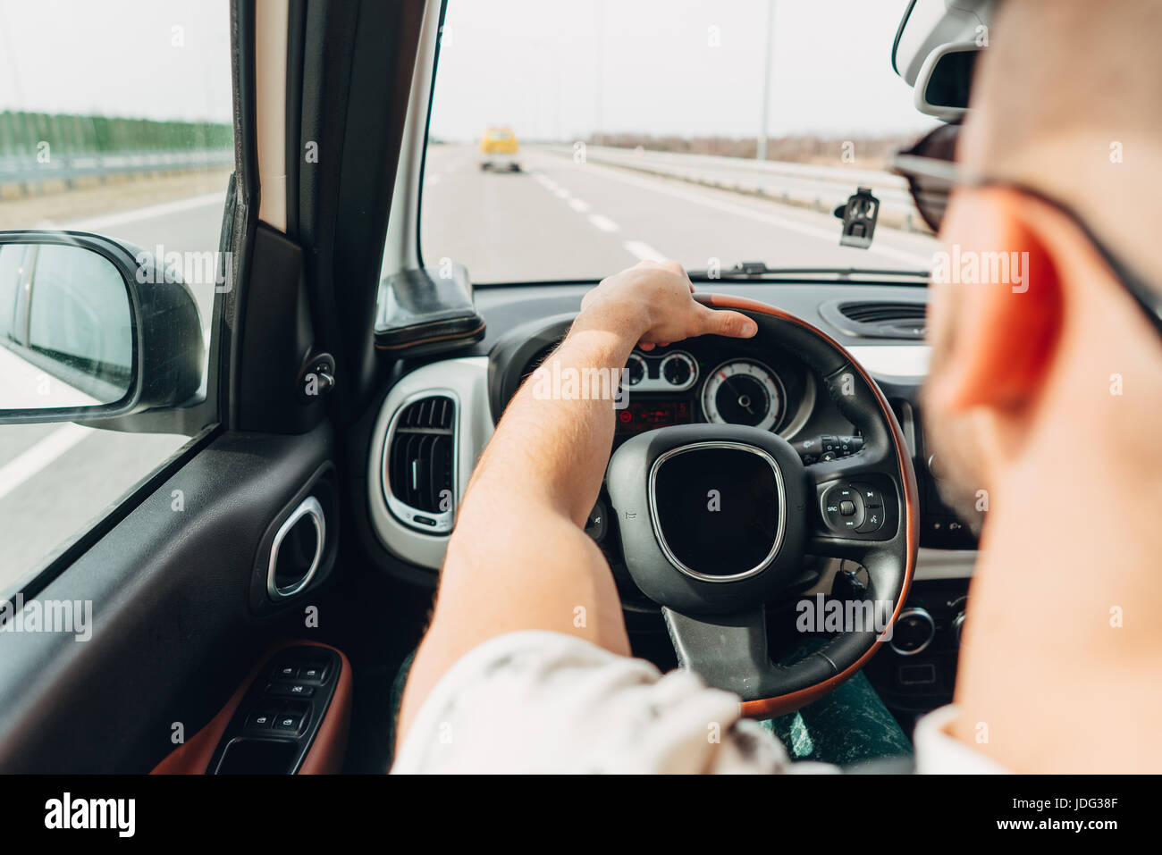Profile young man driving car hi-res stock photography and images - Alamy