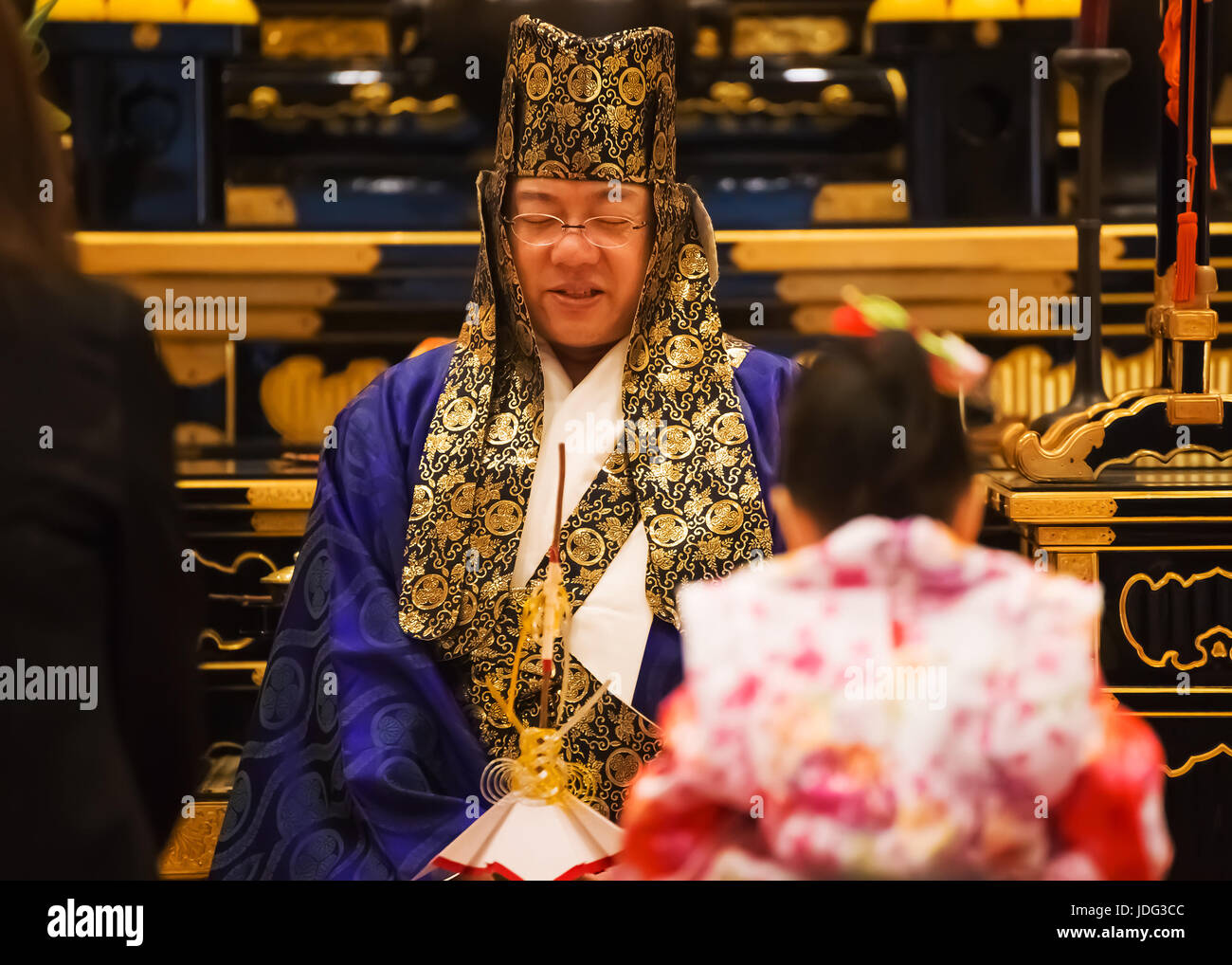 Japanese Monk Prays for a Japanese Girl at the "Shichi-go-san" Celemony ...