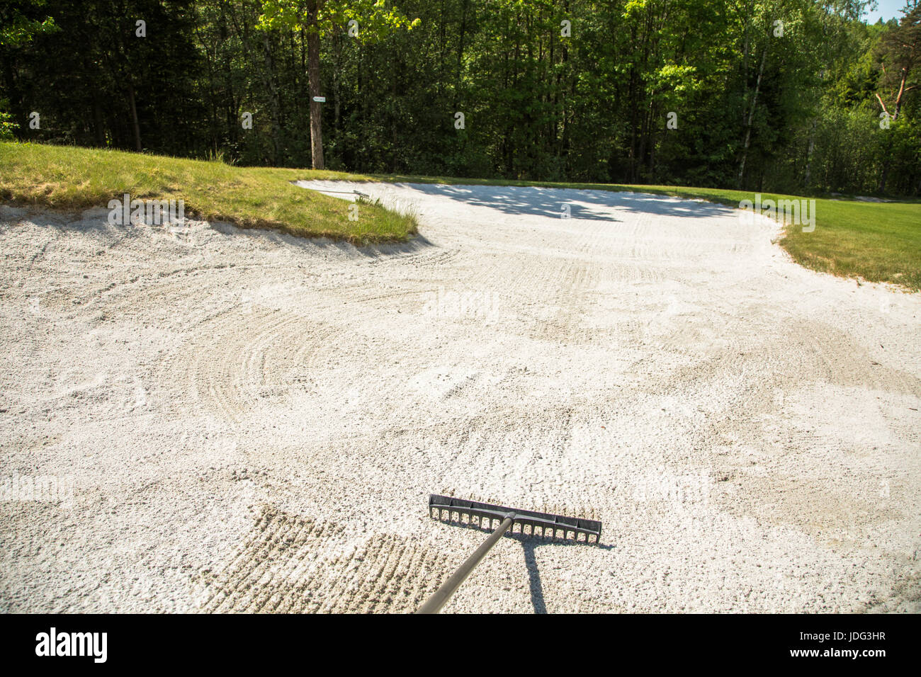 Raking sand bunker hi-res stock photography and images - Alamy